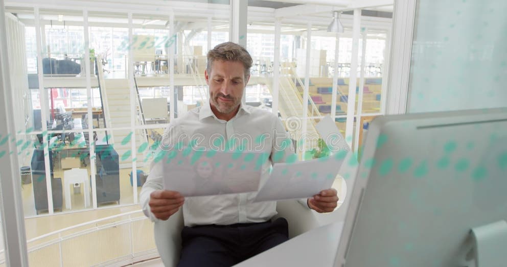 A Happy Business Creative is Working in a Modern Office, Checking ...