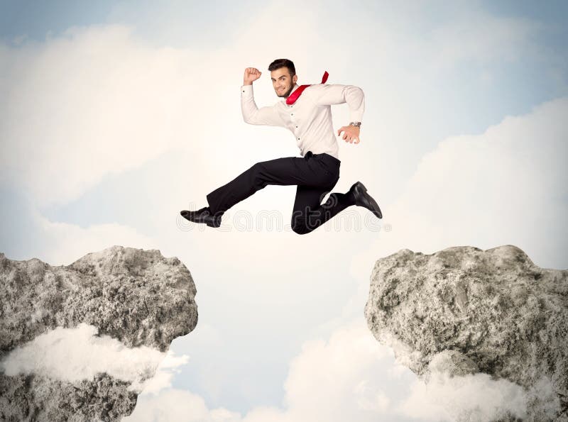 Happy Business Man Jumping Over a Cliff Stock Photo - Image of achieve ...