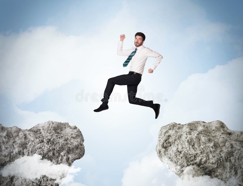 Happy Business Man Jumping Over a Cliff Stock Image - Image of freedom ...