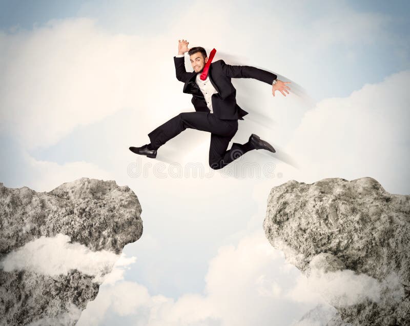 Happy Business Man Jumping Over a Cliff Stock Image - Image of jump ...