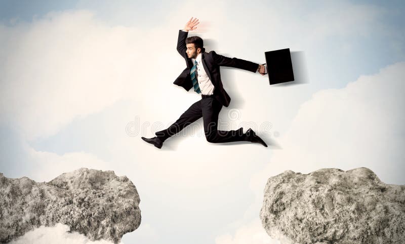 Happy Business Man Jumping Over a Cliff Stock Image - Image of ...