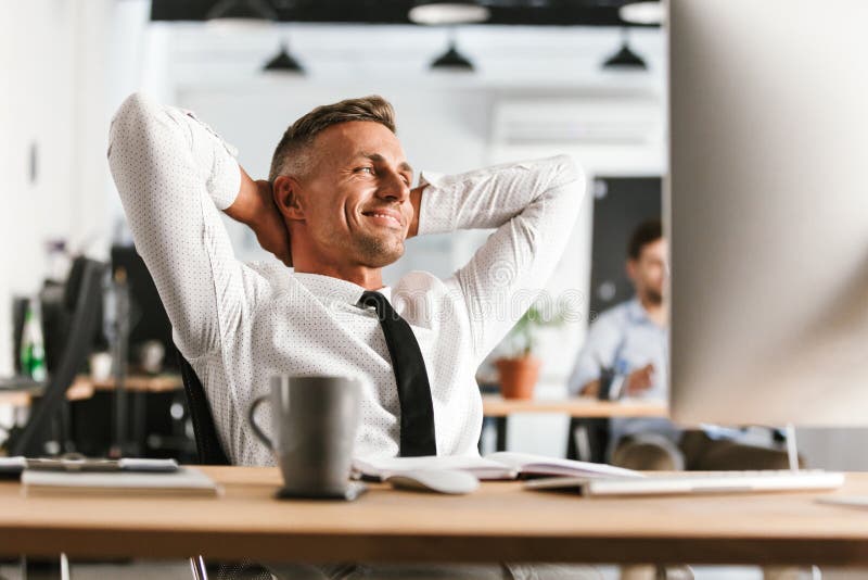 Happy Business Man Sitting in Office Working with Computer Have a Rest ...