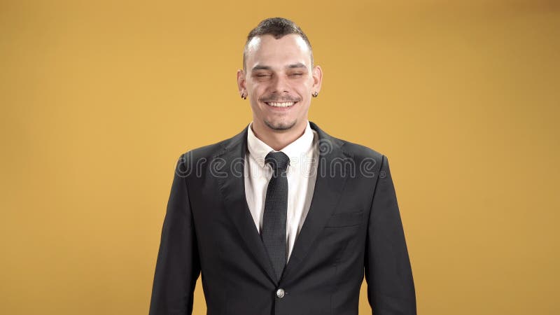 Happy Business Man Smiling and Standing Against Yellow Background ...