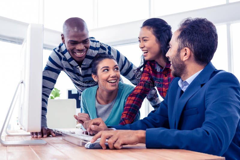 Happy Business People Discussing at Creative Office Stock Photo - Image ...