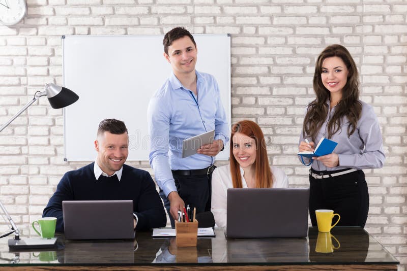 Happy Business People Doing Work at Workplace Stock Image - Image of ...