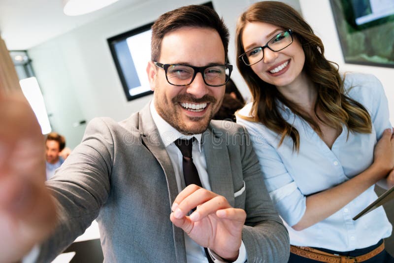 Happy Business People Having Fun and Chatting at Workplace Office Stock ...