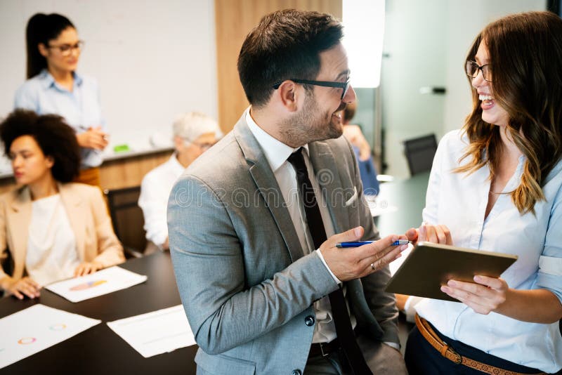 Happy Business People Having Fun and Chatting at Workplace Office Stock ...