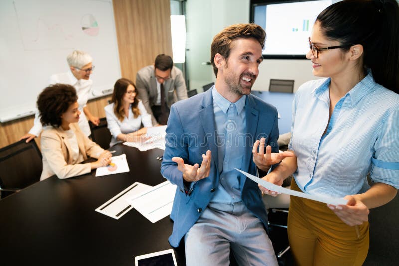 Happy Business People Having Fun and Chatting at Workplace Office Stock ...