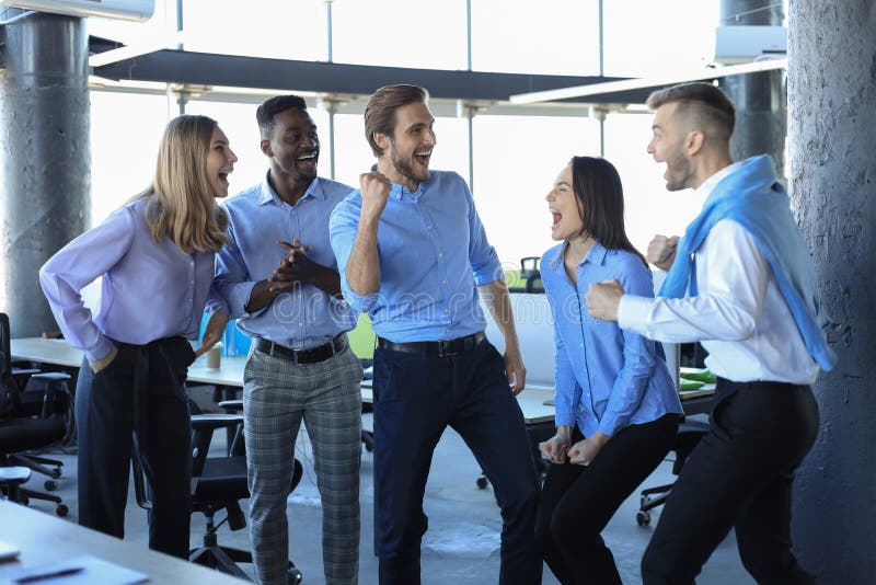 Happy Business People Laugh In The Office Successful Team Coworkers