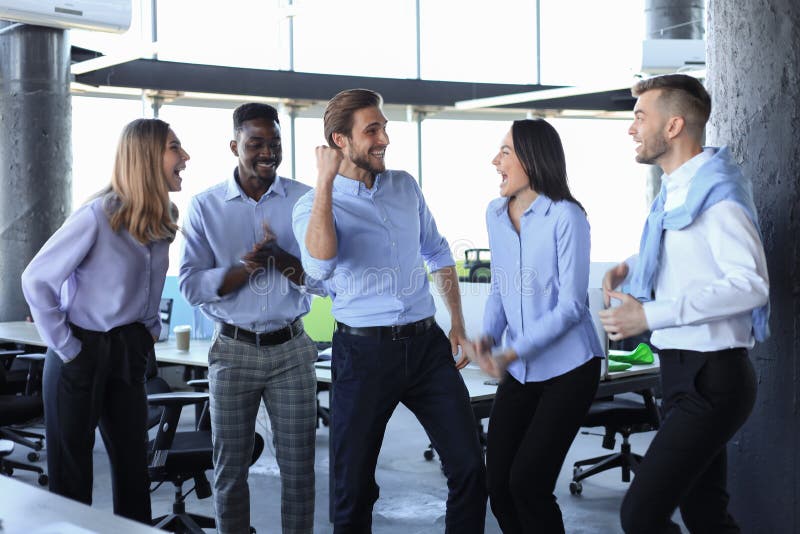Happy Business People Laugh In The Office Successful Team Coworkers
