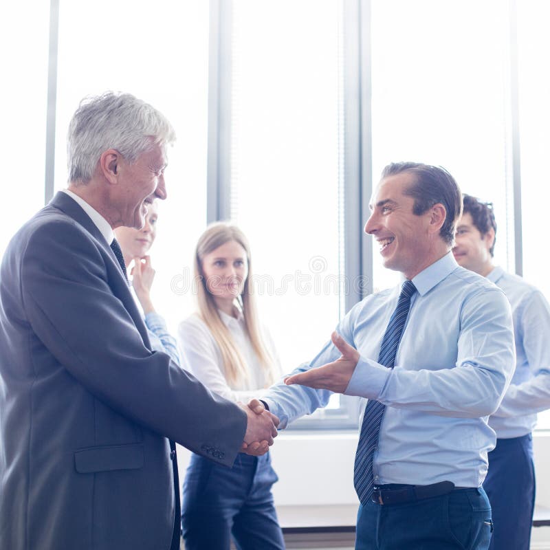Happy Business People Shaking Hands Stock Photo - Image of businessmen ...