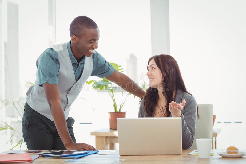 Happy Business People Using Laptop at Desk Stock Image - Image of ...