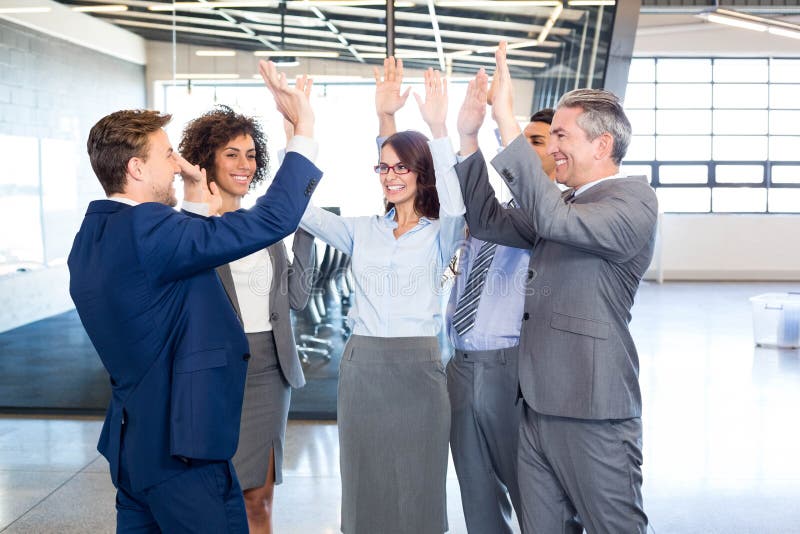 Happy Business Team High Fiving Stock Photo - Image of entrepreneur ...