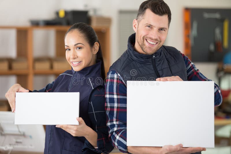 Happy Business Team Holding White Card Stock Image - Image of ...
