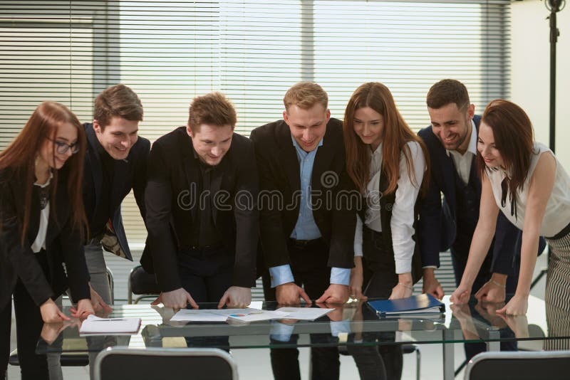 Happy Business Team Looking at Financial Documents . Stock Photo ...