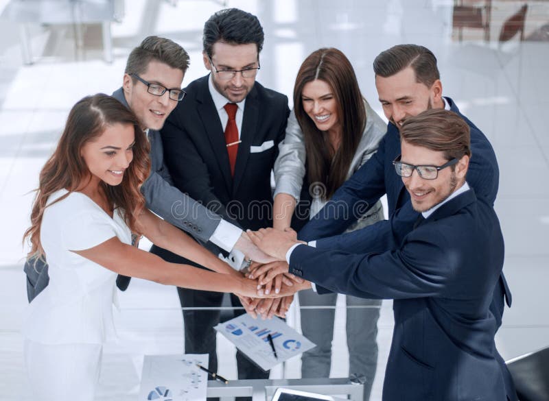 Happy Business Team Makes a Tower Out of Hands Stock Photo - Image of ...