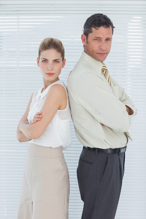 Happy Business Team Posing Back To Back Stock Image - Image of male ...