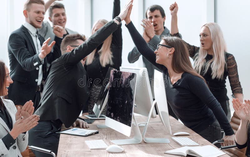 Happy Business Team Showing Their Success in the Workplace Stock Photo ...