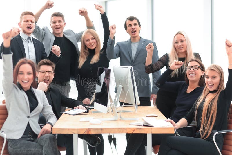 Happy Business Team at the Workplace in the Office Stock Photo - Image ...