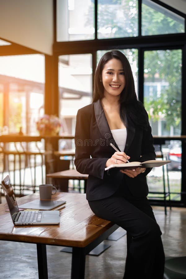 Happy Business Woman Working To Analyze Technical Price Graph and ...