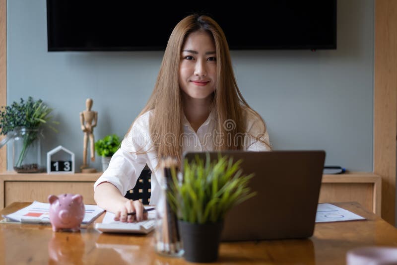 Happy Business Woman Working To Analyze Technical Price Graph and ...