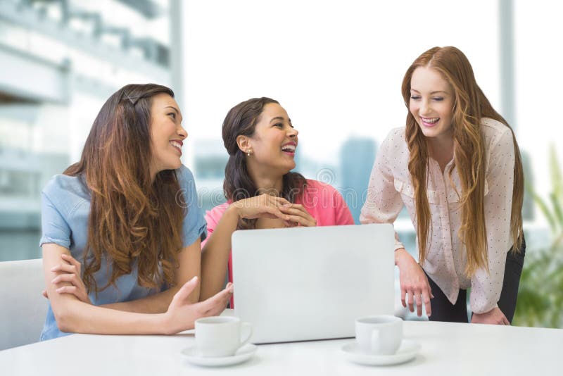Happy Business Women at a Desk Using a Computer Stock Image - Image of ...