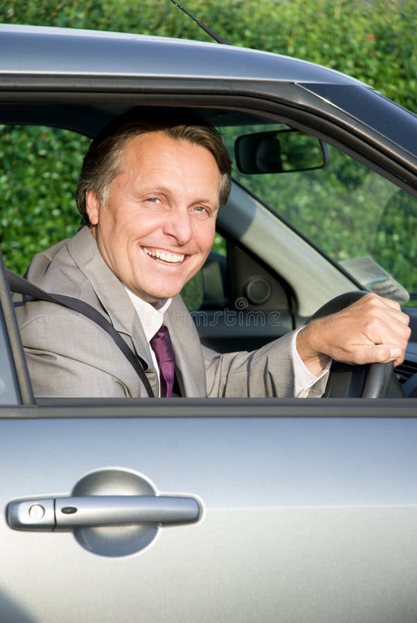 Happy businessman in car stock photo. Image of cheerful - 12187958