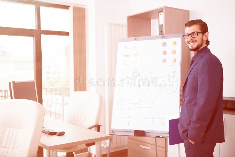Happy Businessman with a Folder with Charts in Hands Next To a F Stock ...
