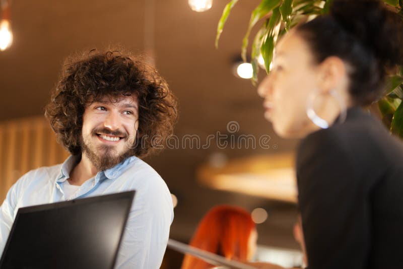 Happy Businessman Having a Creative Meeting with Colleagues Stock Photo ...