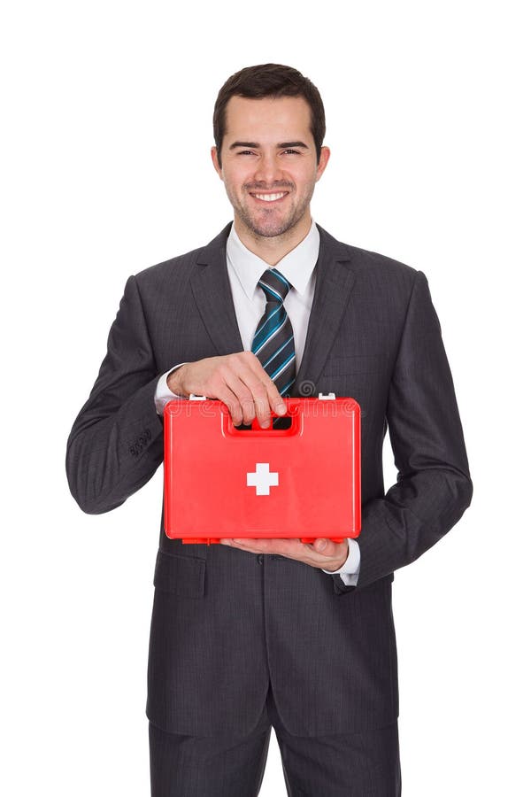 Happy Businessman Holding First Aid Box Stock Image - Image of ...