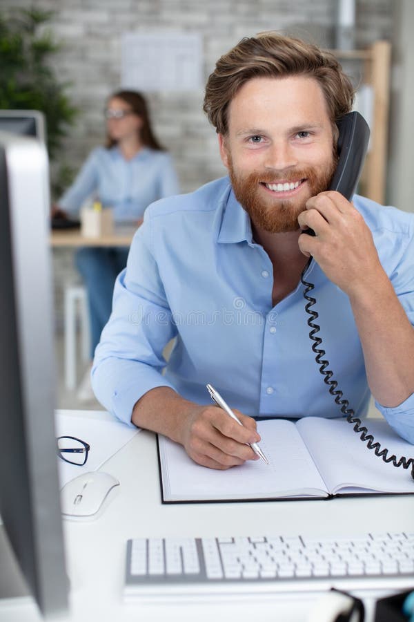Happy businessman on phone stock photo. Image of desk - 239476724