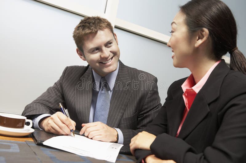 Happy Businessman Signing a Contract Stock Photo - Image of corporate ...