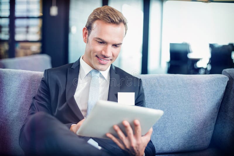 Happy Businessman Using Digital Tablet Stock Photo - Image of device ... Happy Businessman Using Digital Tablet Stock Photo - Image of device ...
