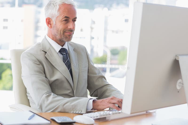 Happy Businessman Working on Computer Stock Photo - Image of office ...