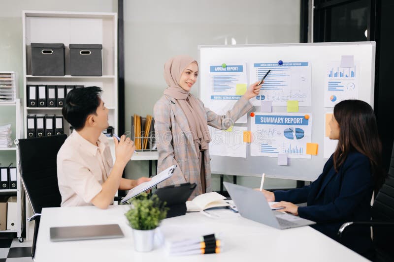 Happy Businesspeople while Collaborating on a New Project in an Office ...