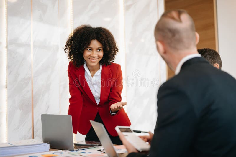 Happy Businesspeople while Collaborating on a New Project in an Office ...