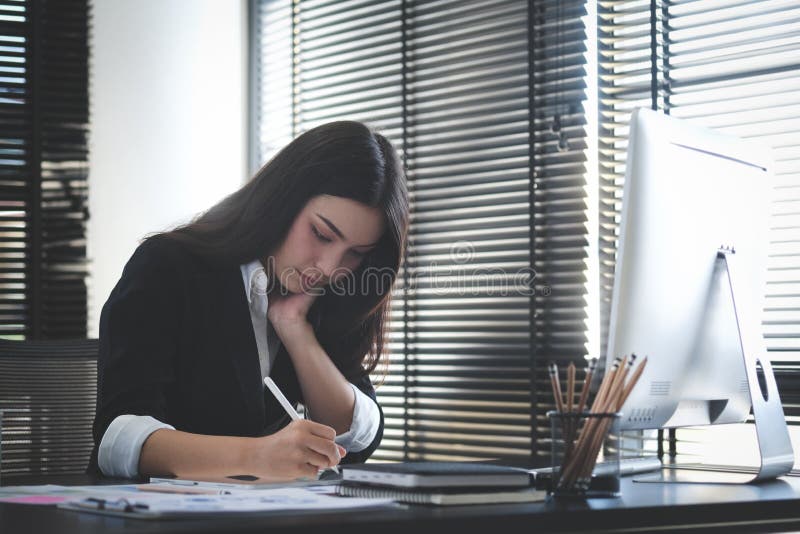 A Happy Businesswoman in Black Suit Working with Computer and Hand ...
