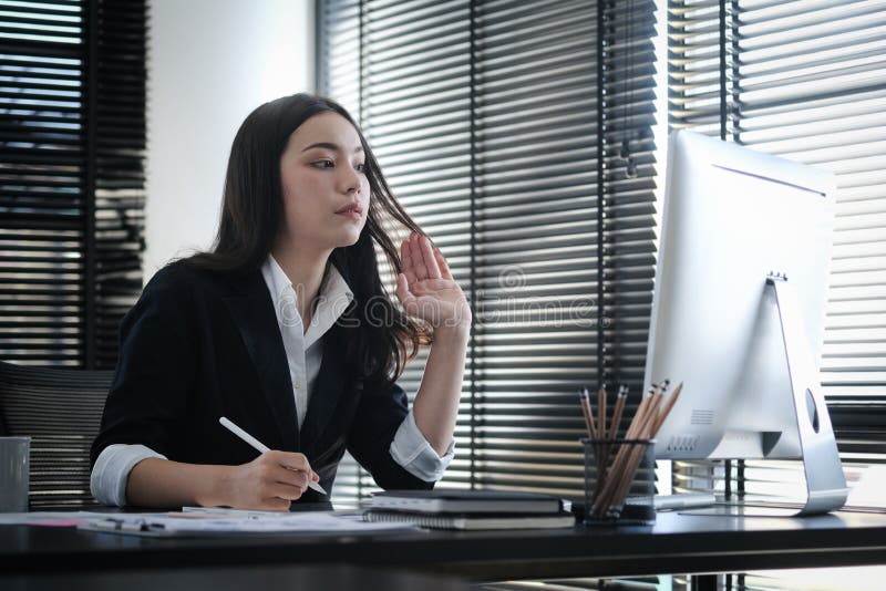 A Happy Businesswoman in Black Suit Working with Computer and Hand ...