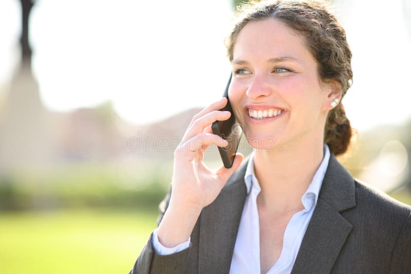 Happy Businesswoman Using Cell Phone Stock Photo - Image of phone ...