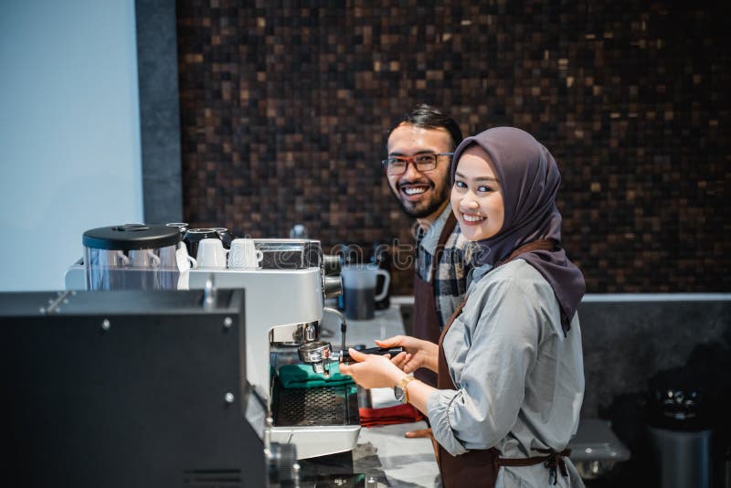 Happy Cafe Worker at the Coffee Preparing To Make Coffee Stock Image ...