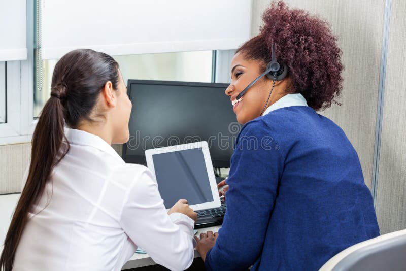 Happy Call Center Employees Discussing while Using Stock Photo - Image ...