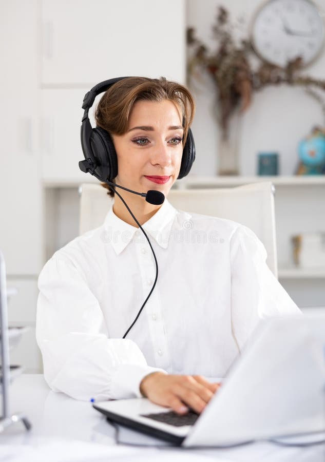 Call Center Operator Talking with Client and Smiling Stock Photo ...