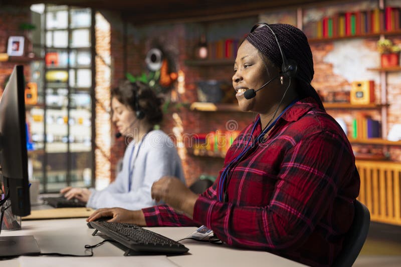 Happy Call Center Worker Working To Reduce Clients Complaints Stock ...