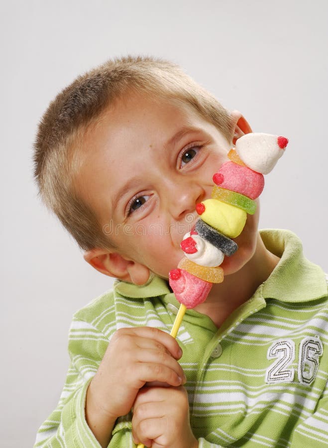 Happy candi. stock photo. Image of hungry, enjoy, male - 11296120