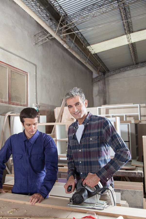 Happy Carpenter Teaches Carpentry Stock Image - Image of electric ...