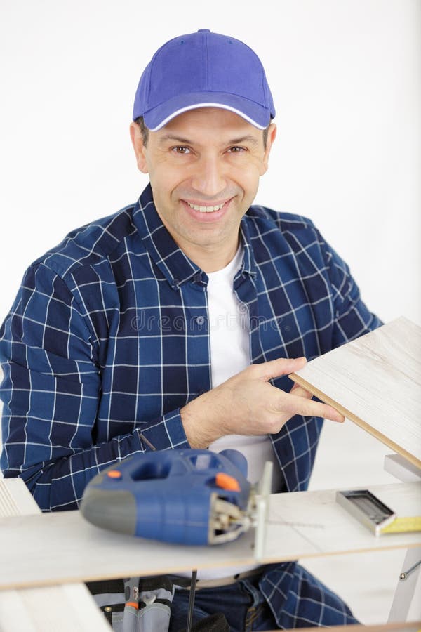 Happy carpenter at work stock image. Image of push, builder - 257189895