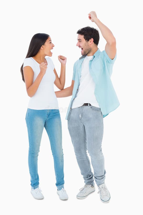 Happy Casual Couple Cheering Together Stock Photo - Image of stubble ...