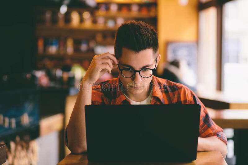 Happy Casual Man Using Laptop Computer in Cafe Stock Photo - Image of ...