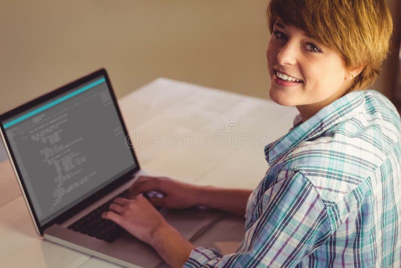 Happy Caucasian Female Programmer Siting at Desk, Using Laptop with ...