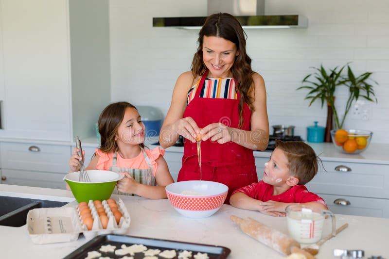 Happy Caucasian Mother Daughter And Son Baking Together Making